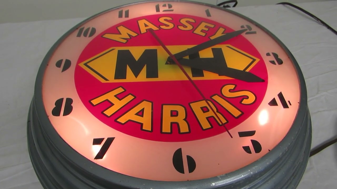 Lot 3018 - Massey Harris Clock (lights up and working) - YouTube