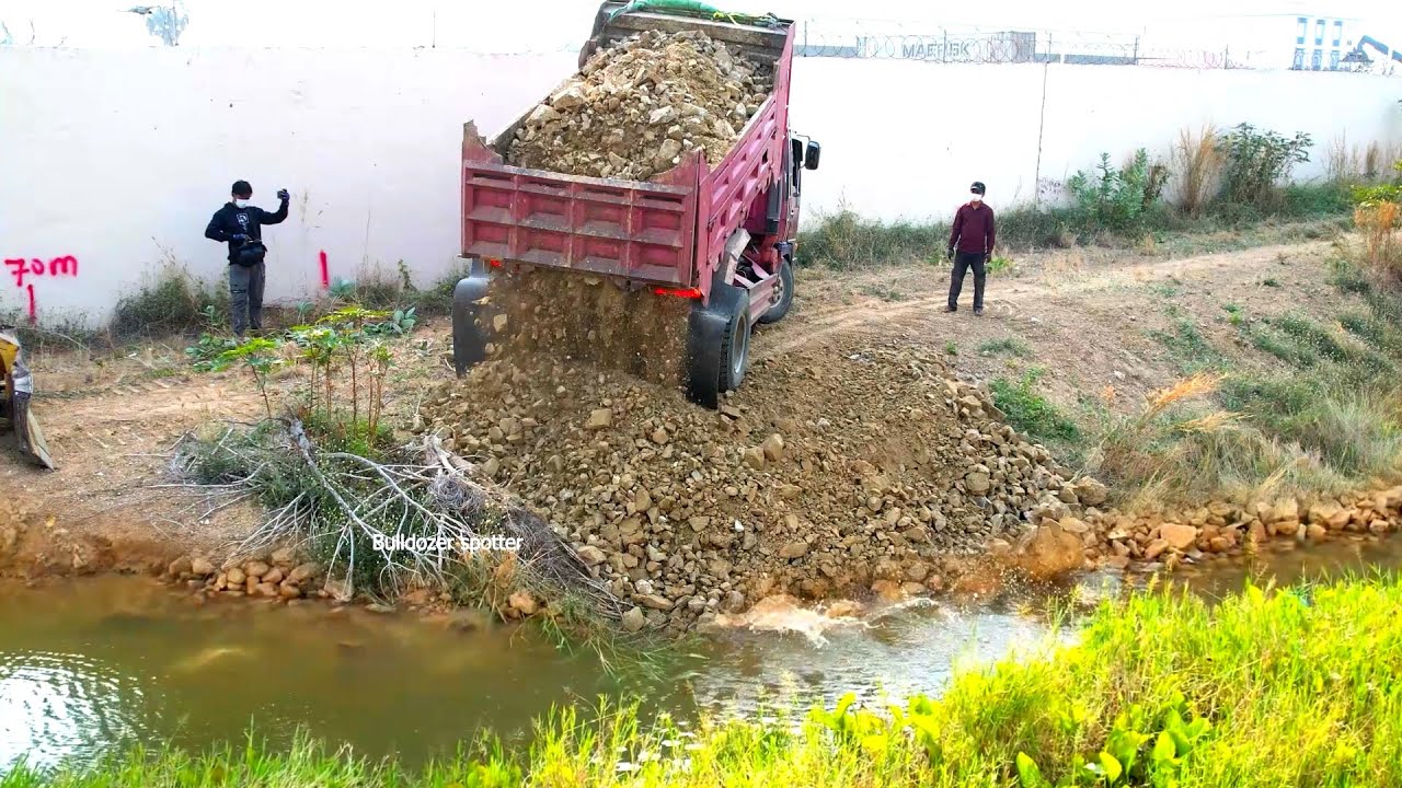 INCREDIBLE FIRST DUMP TRUCK Unloading stone Landfilling and Skill ...