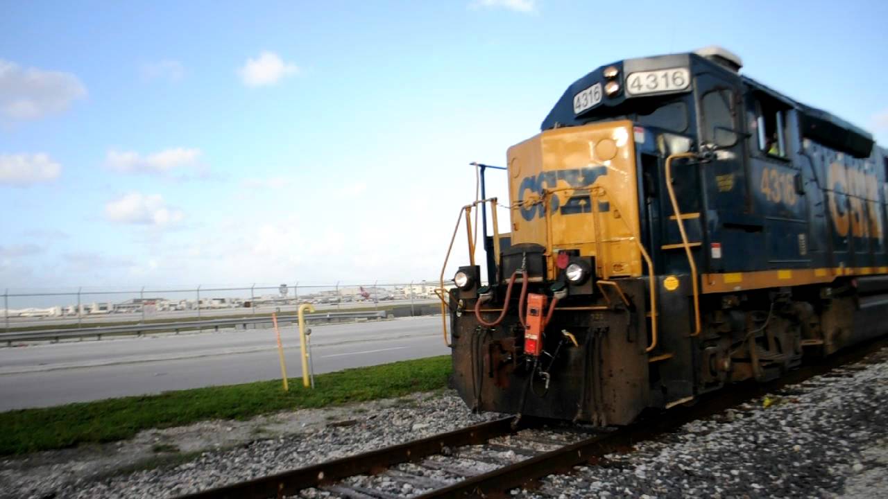 CSX train at miami international airport crossing - YouTube