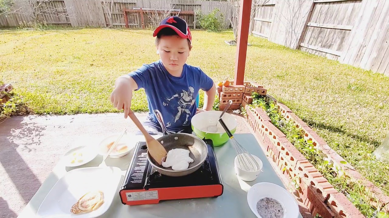 Ryan Cooking Pancakes & Scrambled Eggs - YouTube
