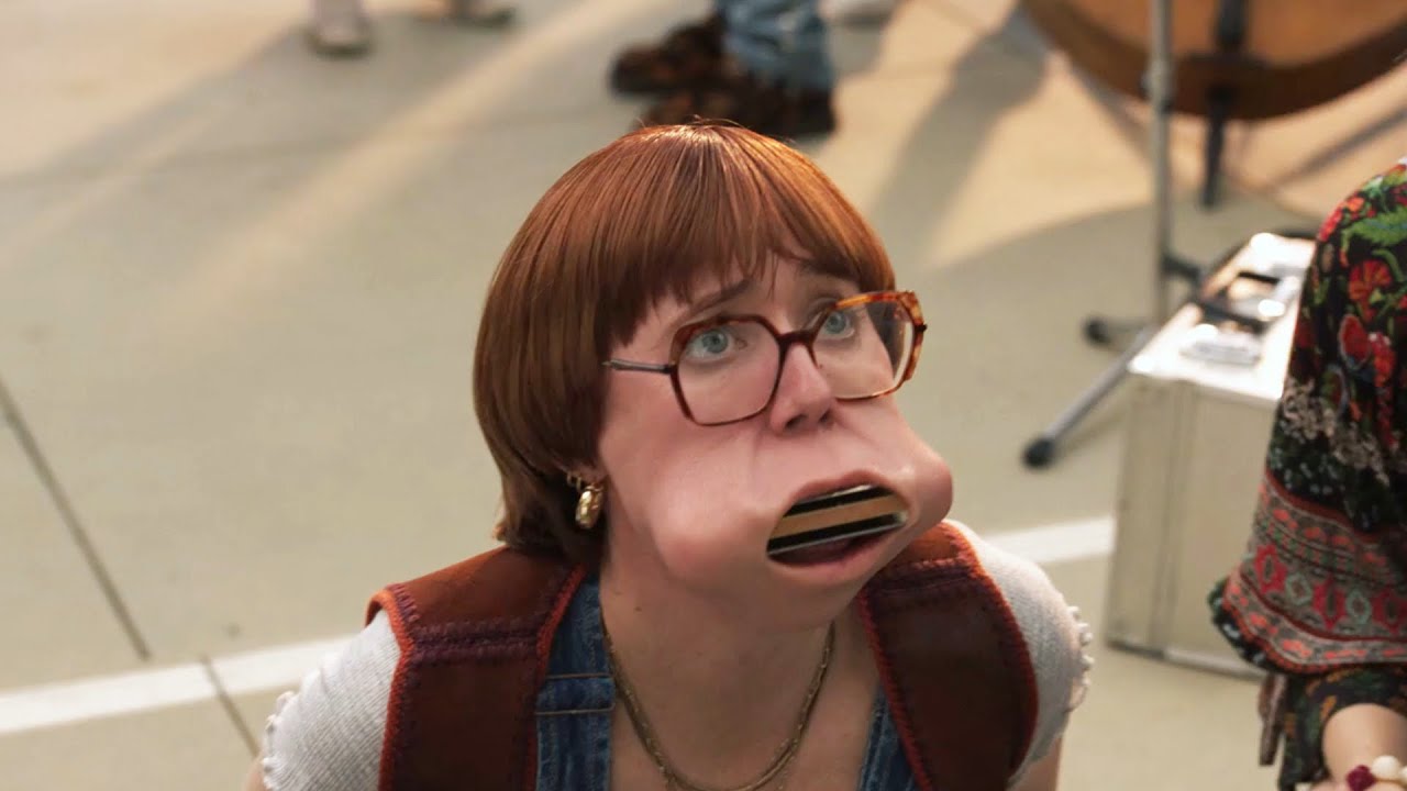 A harmonica stuffed in her mouth! - YouTube
