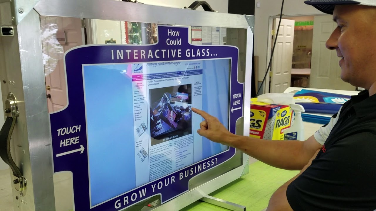 Interactive glass touchscreen demo - YouTube