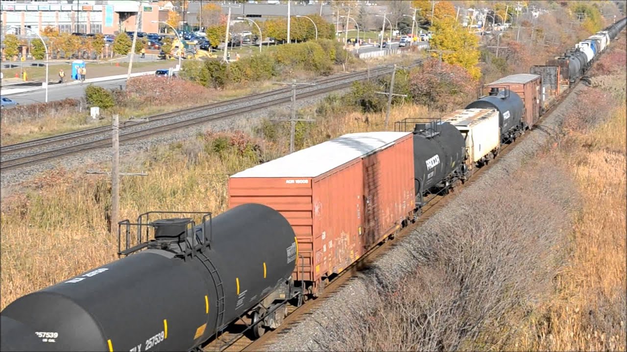 CN TRAIN WITH MIXED FREIGHT IN MONTREAL QUEBEC - YouTube