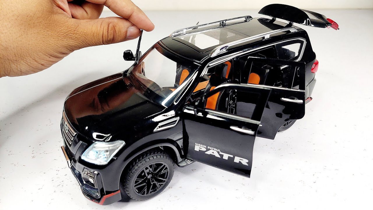 Unboxing of Nissan Patrol SUV Diecast Model Car Scale Model 1:24 - YouTube