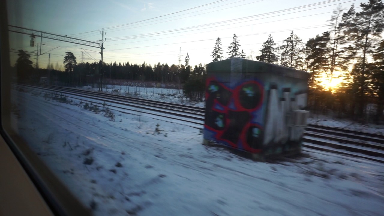 Sweden, train ride from Rotebro to Stockholm Central Station (window ...