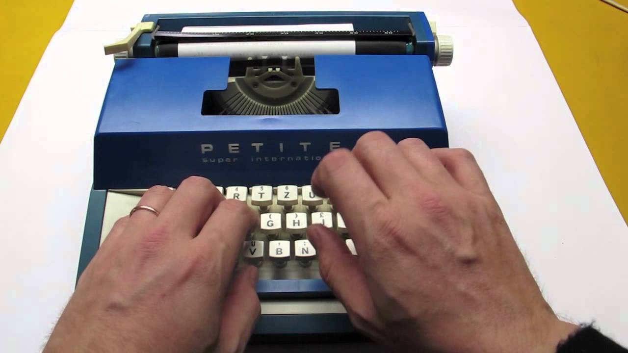 Petite toy typewriter - YouTube