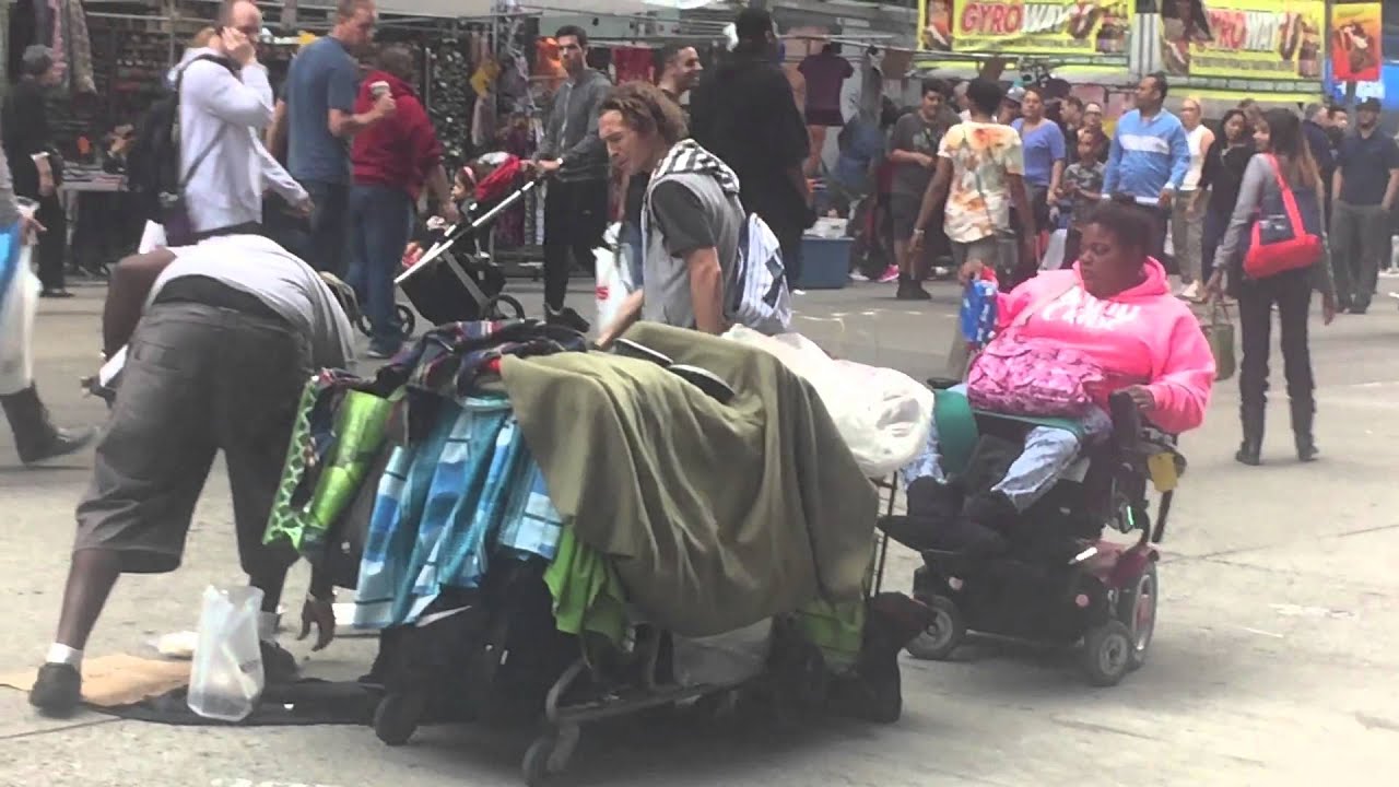 Crazy Homeless Wheelchair Fight in Times Square! - YouTube