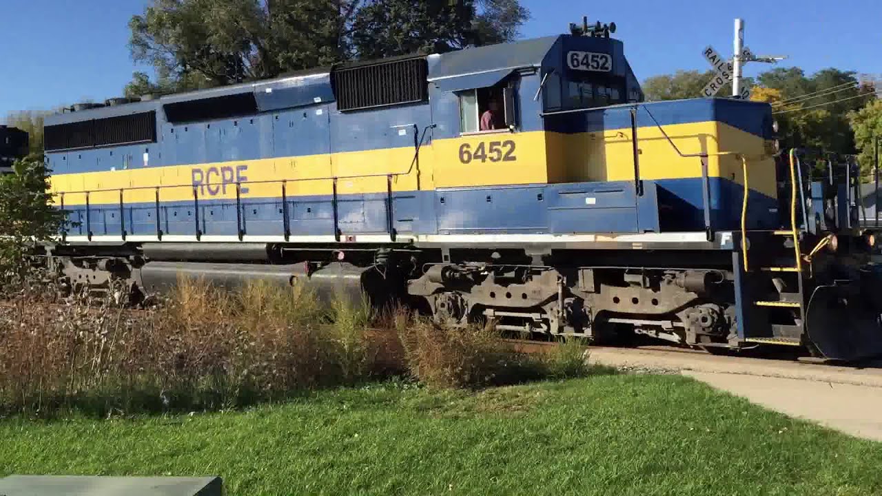 RCPE train 6452 passes Pewaukee lake - YouTube