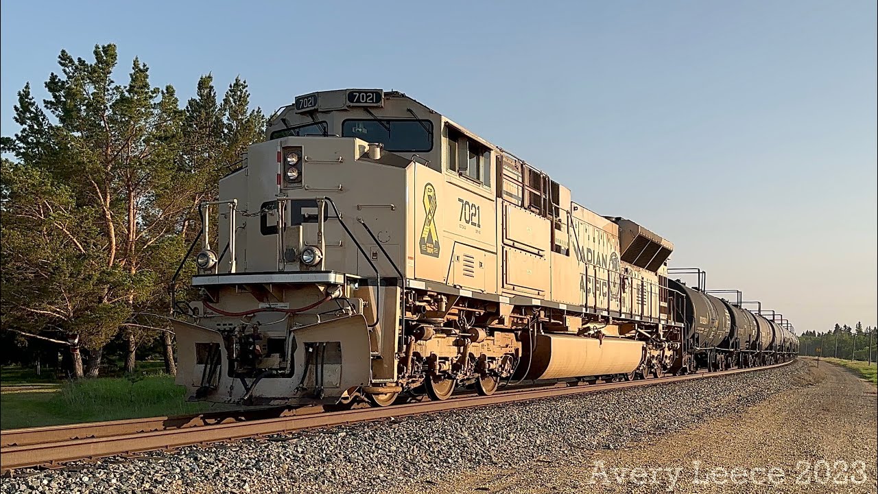A Southbound CPKC Train with 7021 as the DPU on the Leduc Sub - YouTube