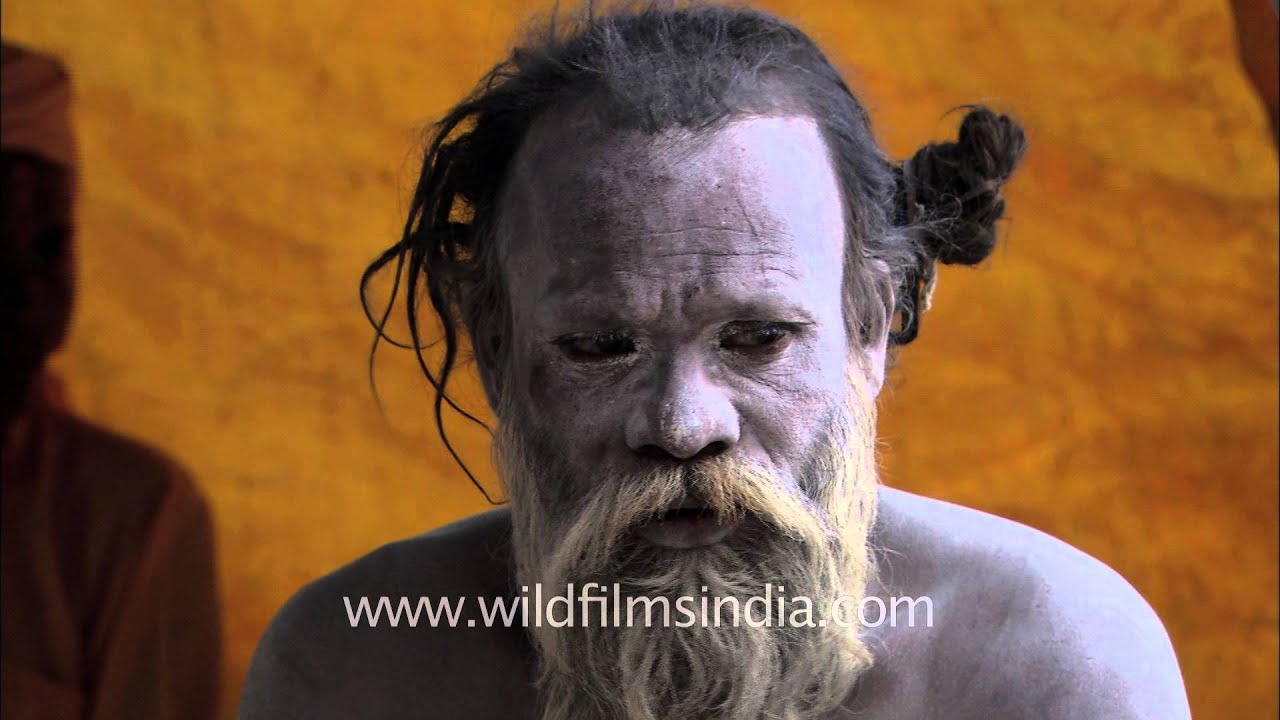 Naga baba chatting with friends on mobile phone... - YouTube