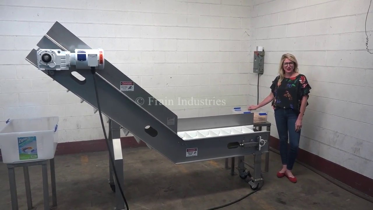 Stainless Steel Inclined Cleated Feed Conveyor Demonstration - YouTube
