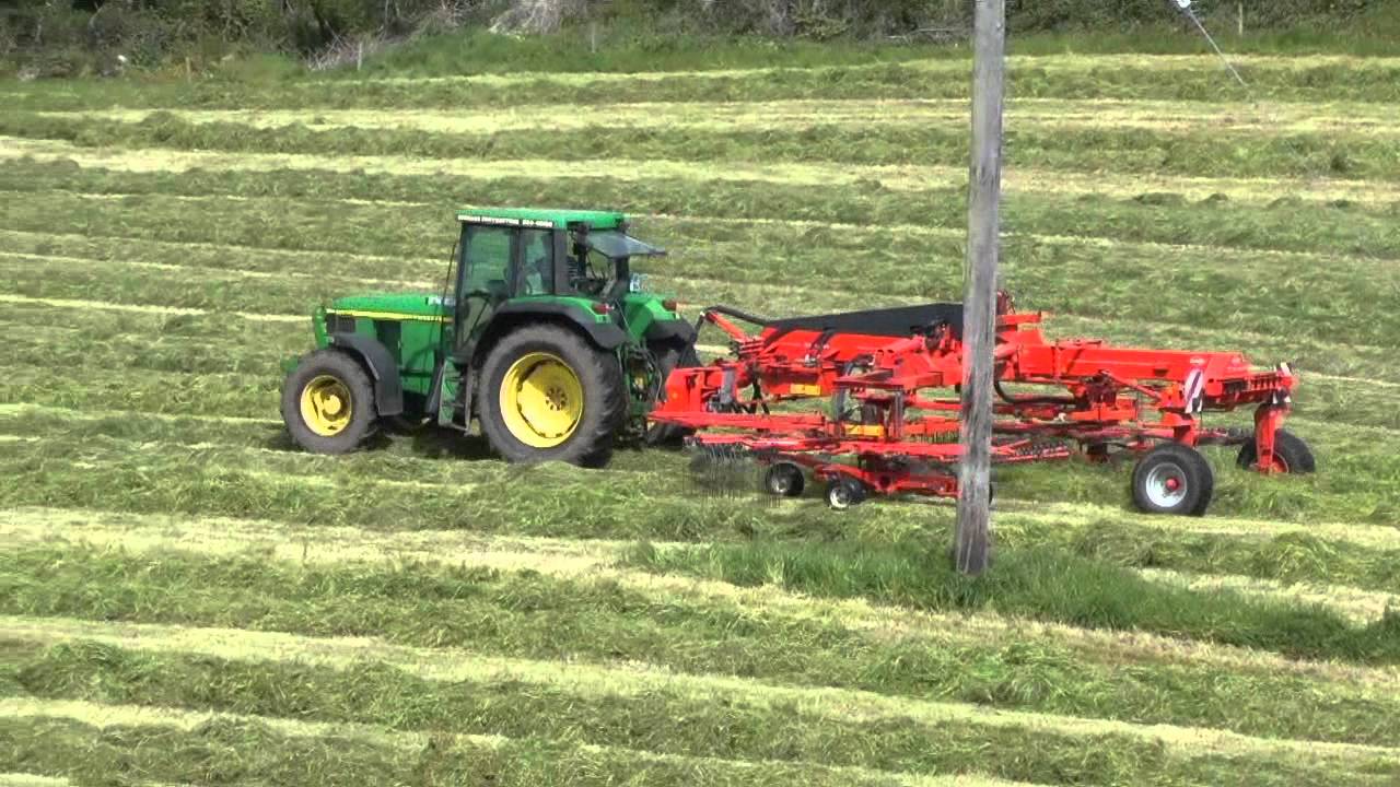 Silage in Ireland - "The "Early Bird" Raking. - YouTube