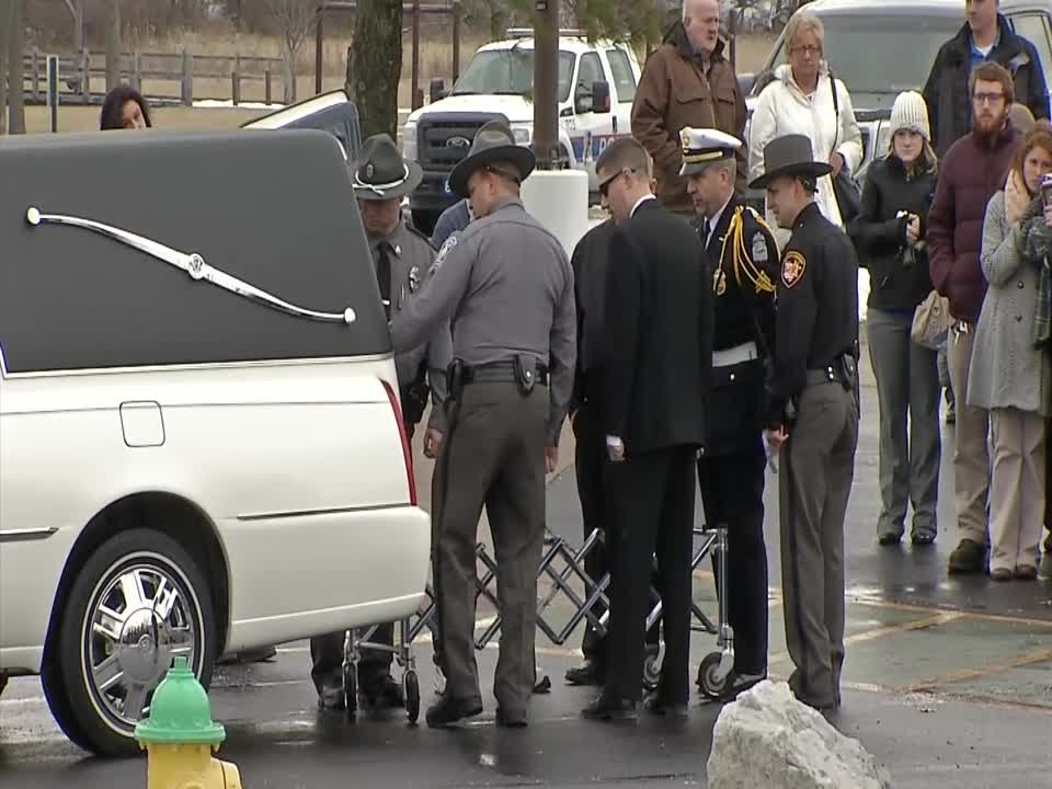 Casket arrives for officer Cottrell's funeral - YouTube