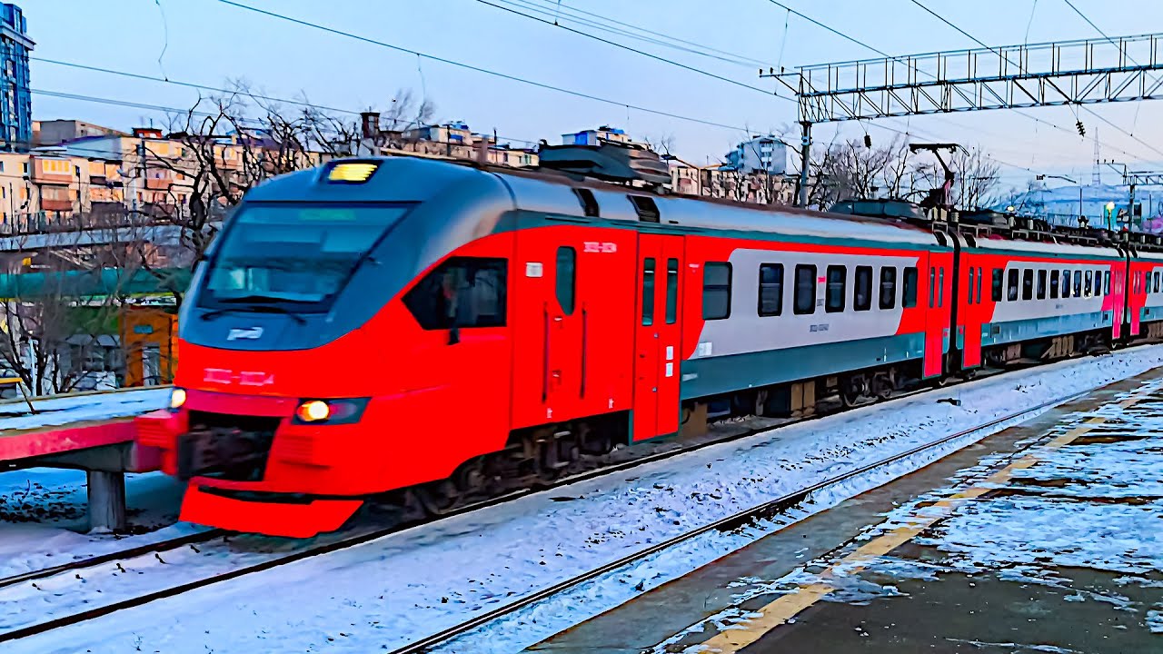 Railway. Evening Russian commuter trains & one freight train / Вечерние ...