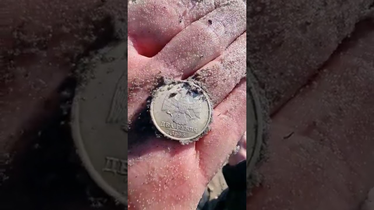Tourists drop tons of coins on the beach - YouTube