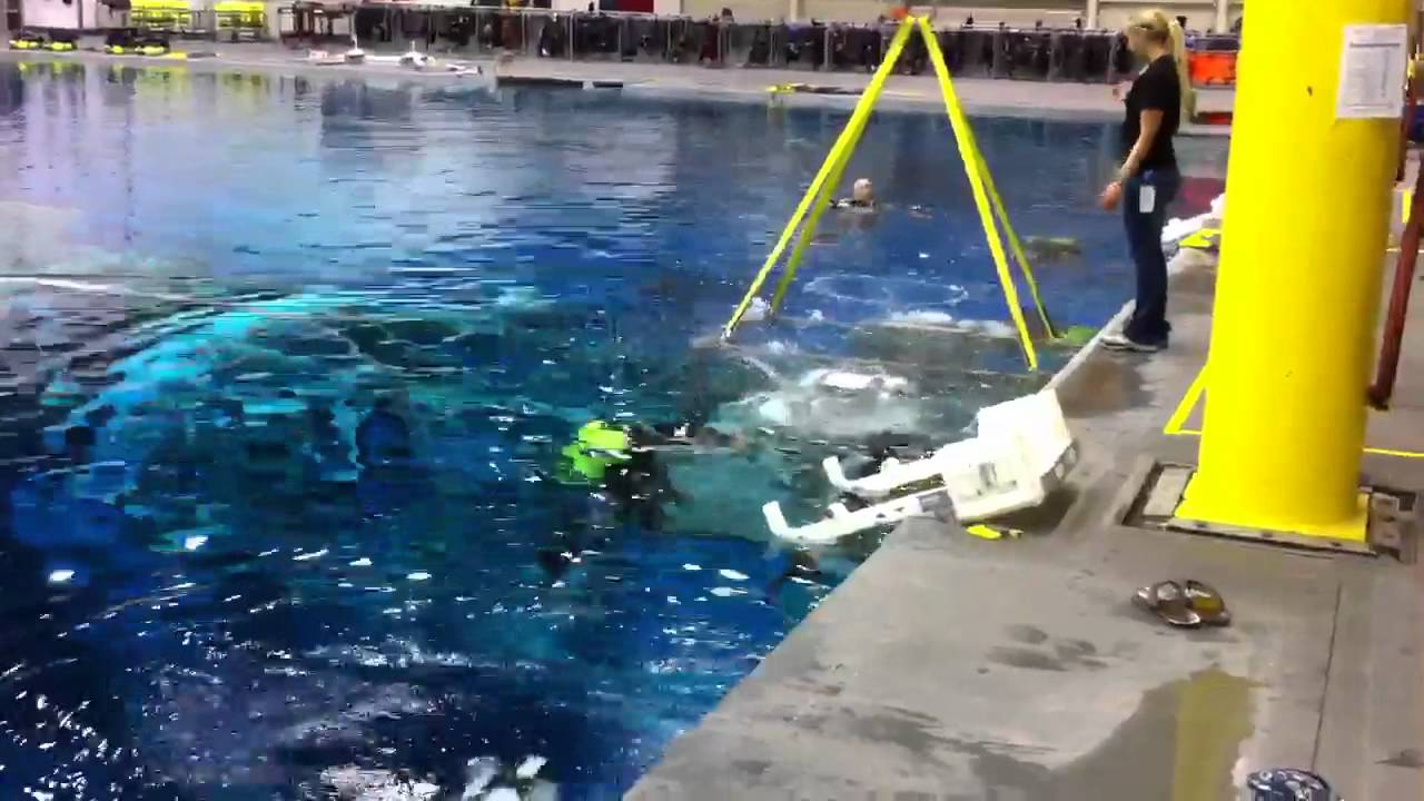 Putting astronauts into the pool - YouTube