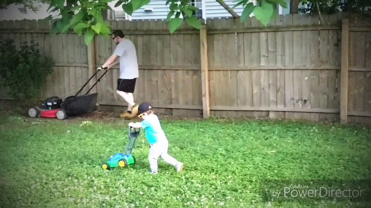 2 years old and cutting the grass with Dad - YouTube