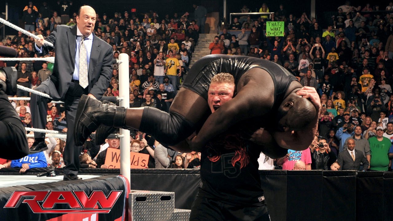 Brock Lesnar returns to WWE with the WWE World Heavyweight Title in his ...