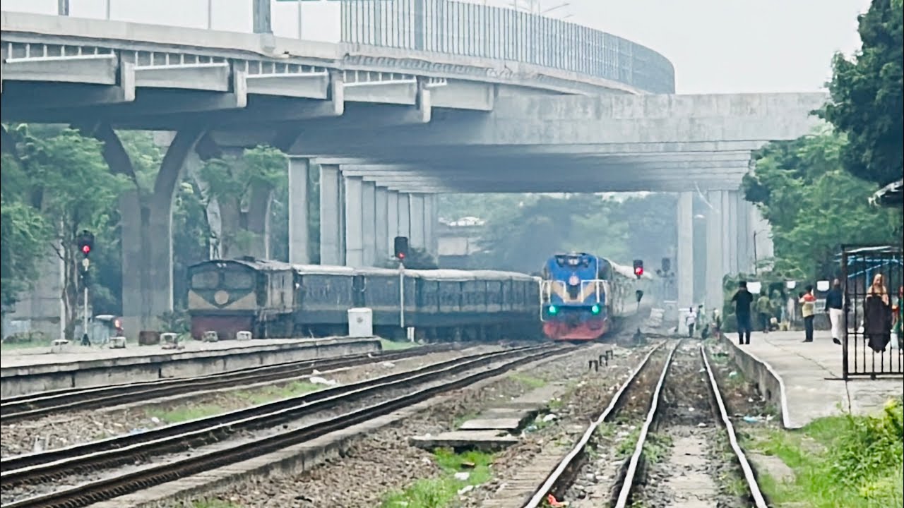 Multiple trains in action including a Progress Rail Made locomotive in ...