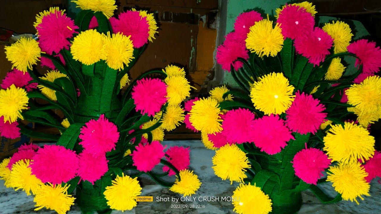 easy way to make guldasata flower//how to make woolen flowers//it so ...