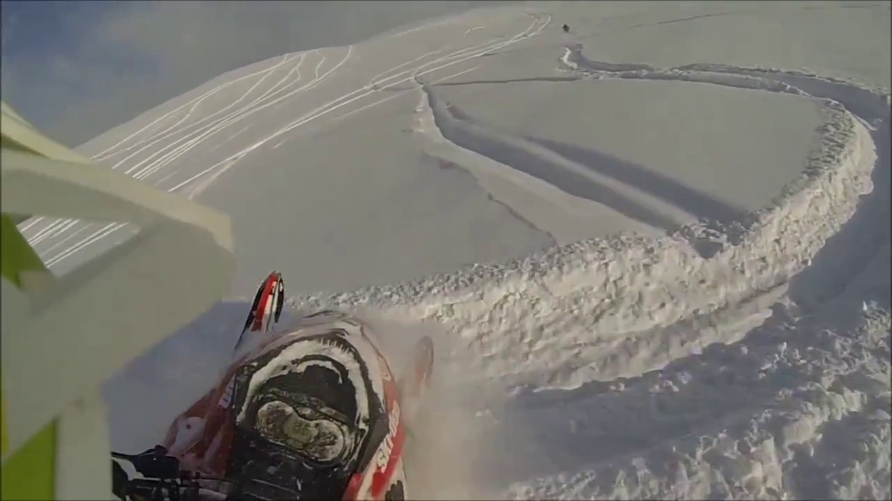 Backcountry Snowmobiling Mountain Sled Riding Snowmobile in Deep Powder ...