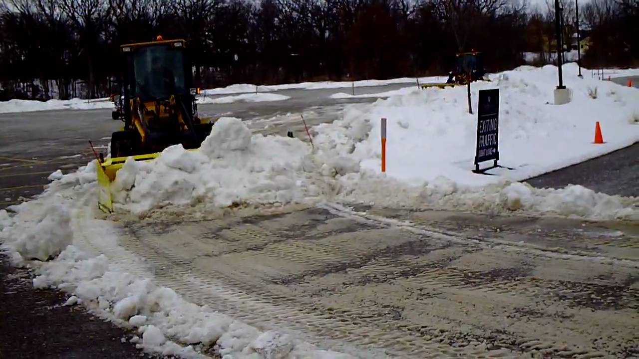 244j pushing snow - YouTube