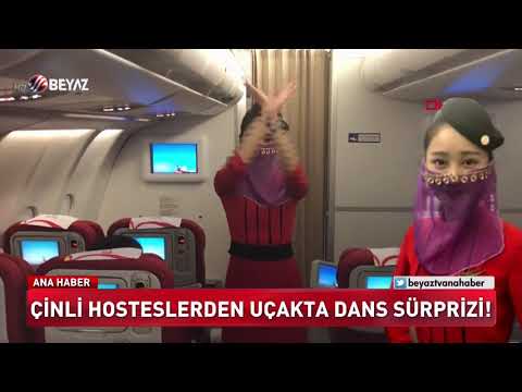 ÇİNLİ HOSTESLERDE UÇAKTA DANS SÜRPRİZİ