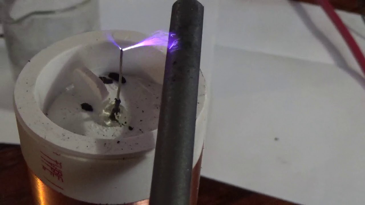 Tesla Coil vs Graphite Rod - YouTube