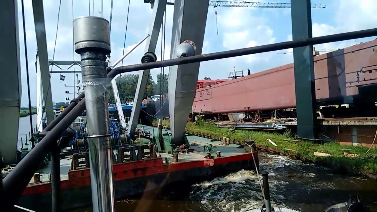 Triton floating crane tugged - YouTube
