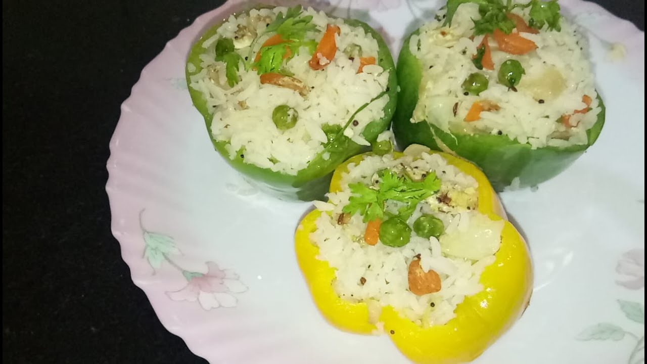 Capcium with stuffing rice//Capsicum stuffed Egg fry rice by Kalpana ...