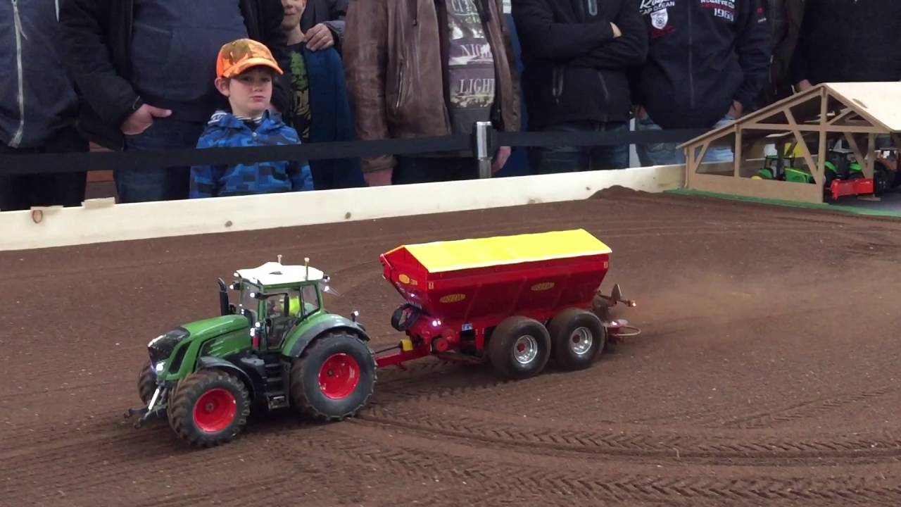 RC Tractor in Action on a Field at a Farmshow - YouTube