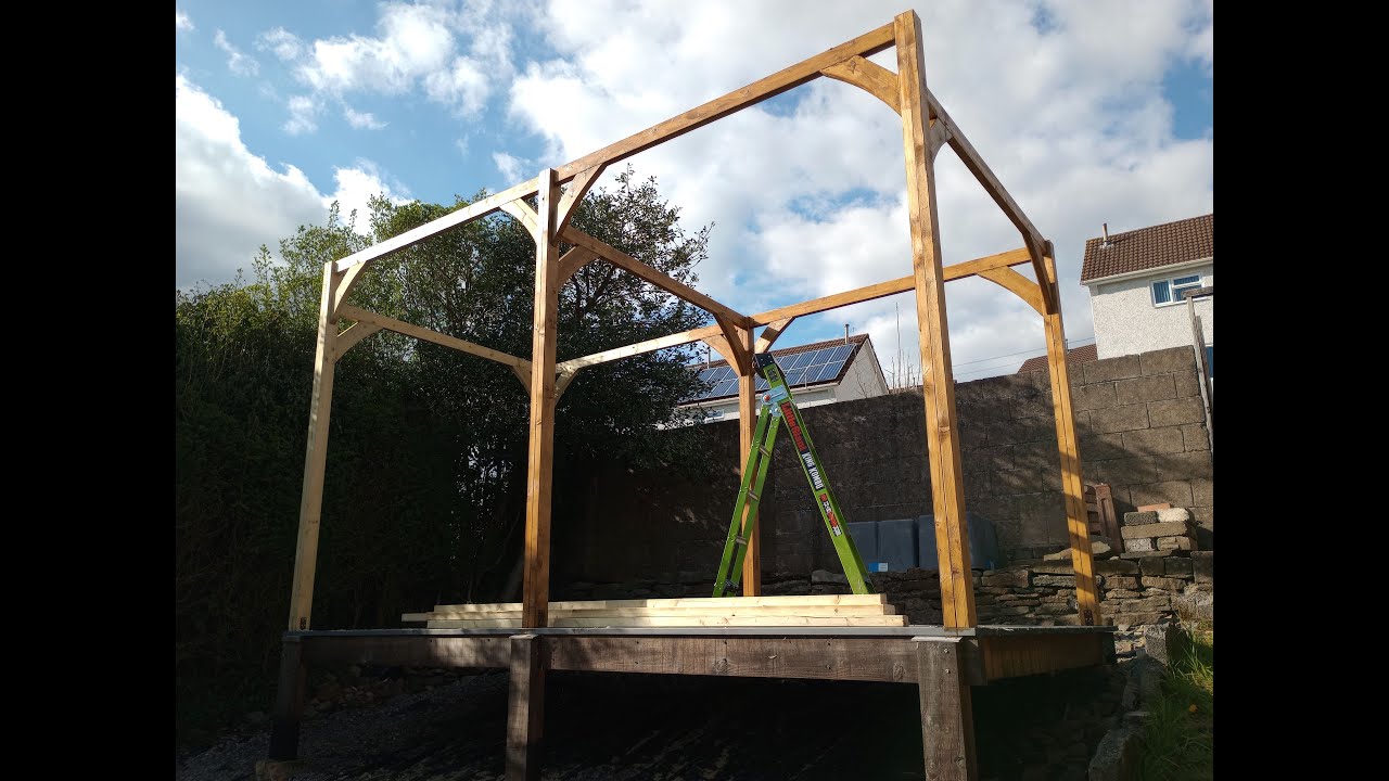 Completing the workshop roof frame using decorative corner braces and ...