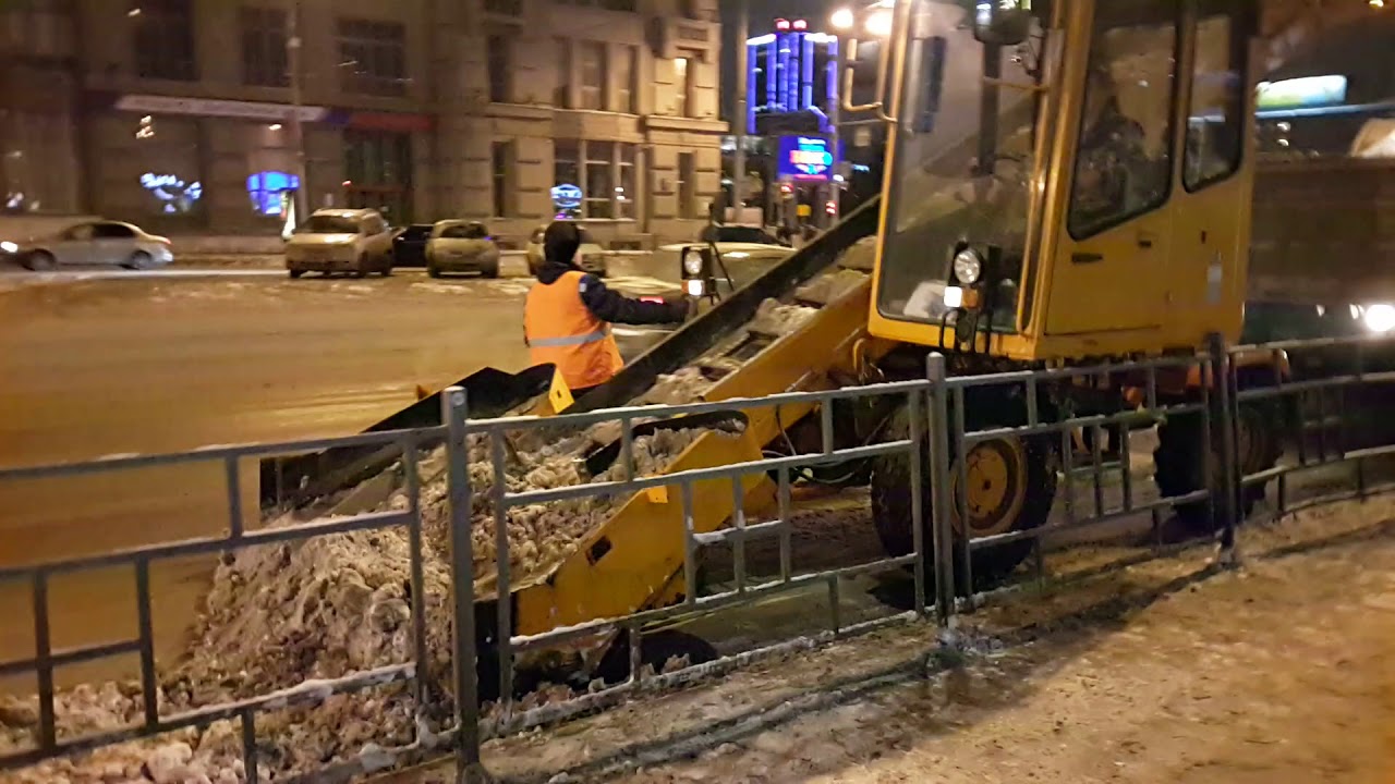 Snow Removal Machine with active shovels and conveyor belt in ...