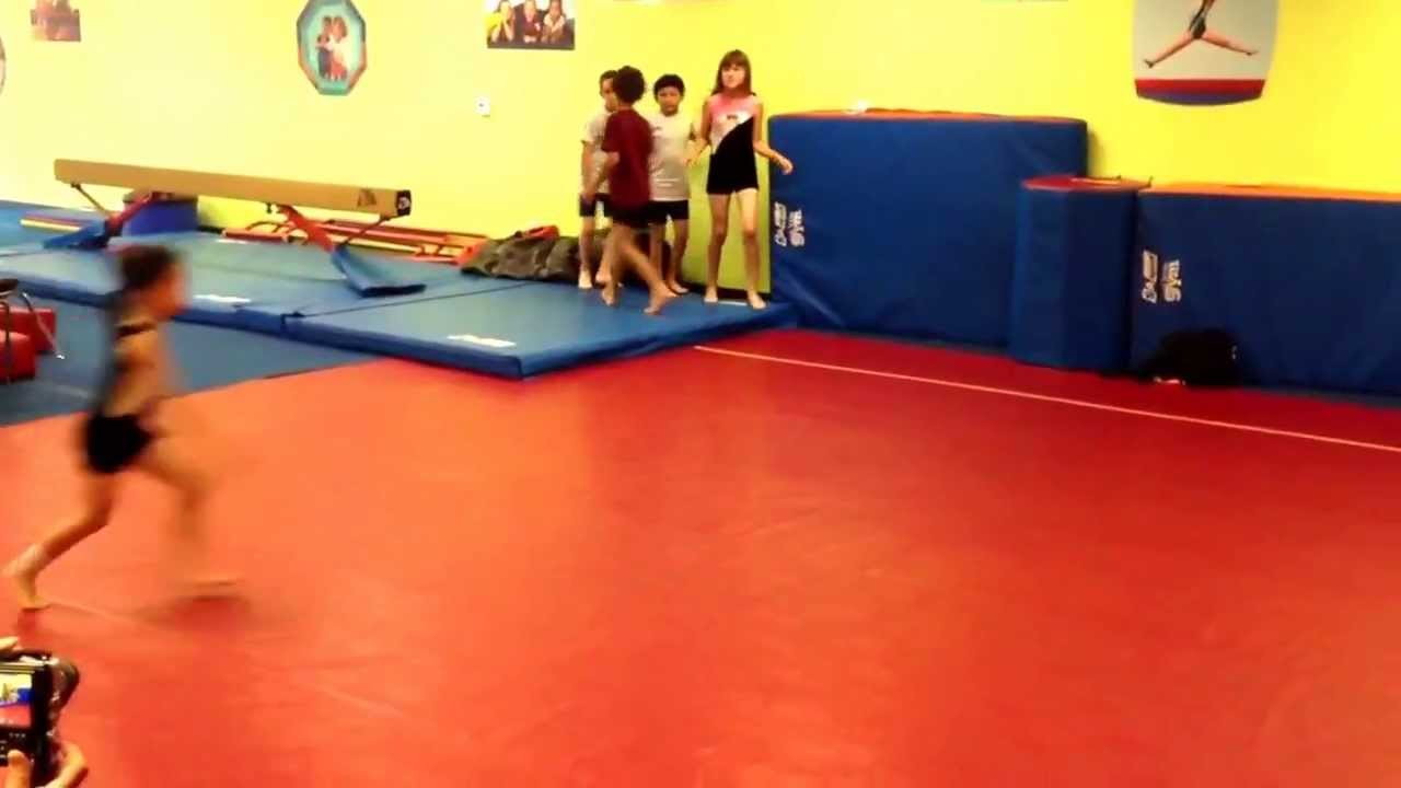 Advanced boys and girls gradeschool gymnastics group tumbling routine ...