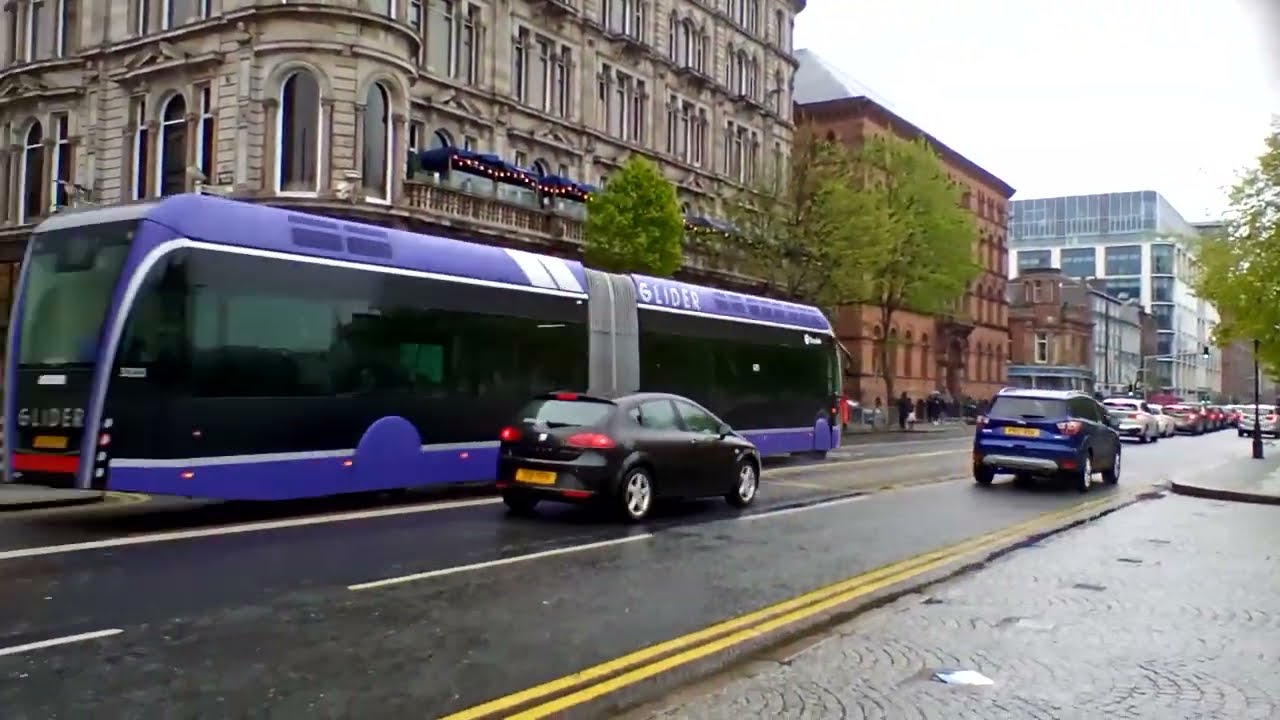 VANHOOL bus Translink GLIDER 3223 passing Visit Belfast in Belfast ...