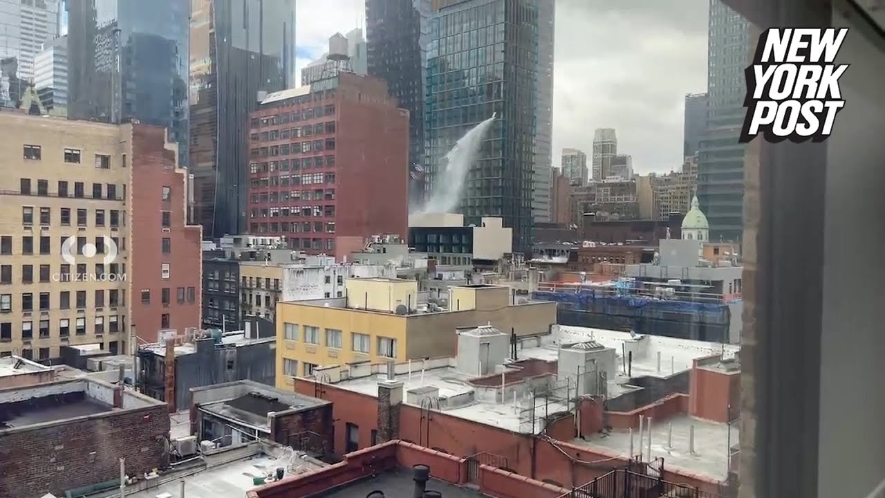 Wild video shows torrent of water bursting out of NYC high-rise - YouTube