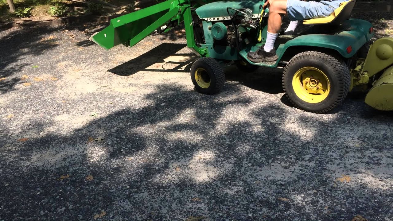 John Deere 140 with a little buck loader - YouTube