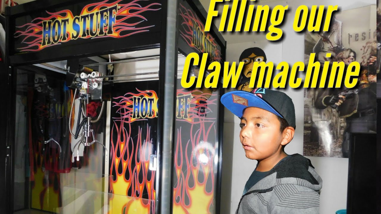 Filling our claw machine - YouTube