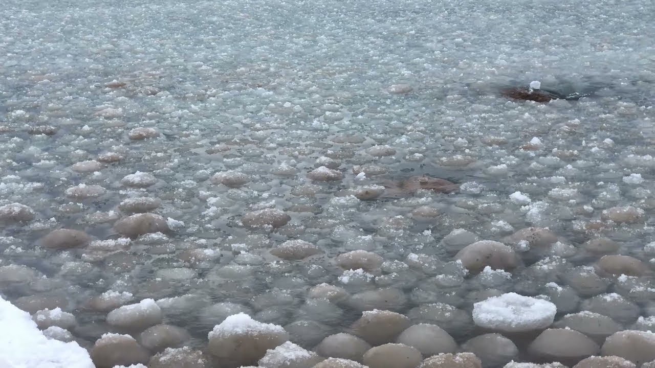 Bizarre Naturally Formed Ice Spheres || ViralHog - YouTube