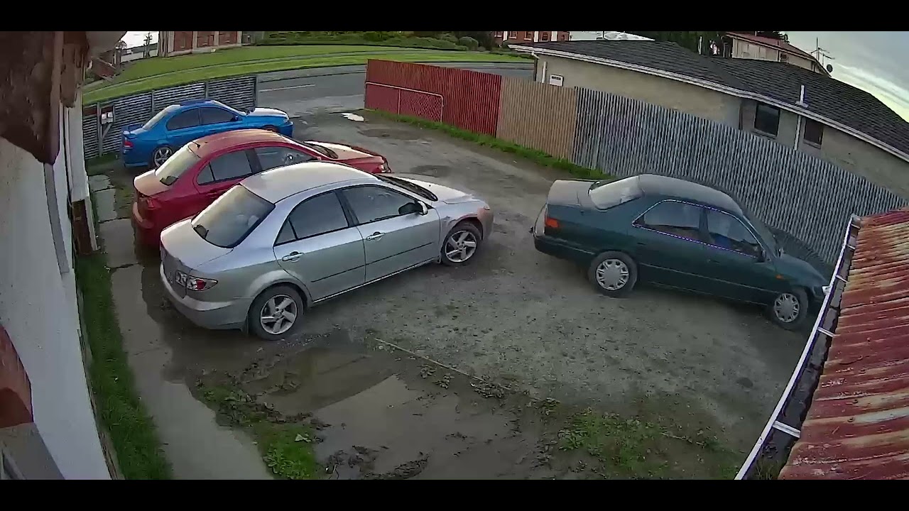 Woman Parking Car in Reverse Accidentally Crashes Into Another Car ...