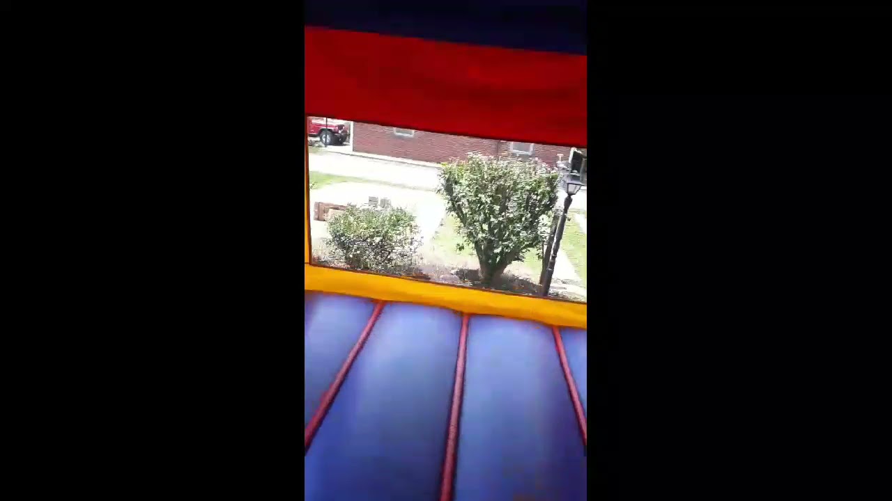 TRAPPED in a DEFLATING BOUNCE HOUSE - YouTube