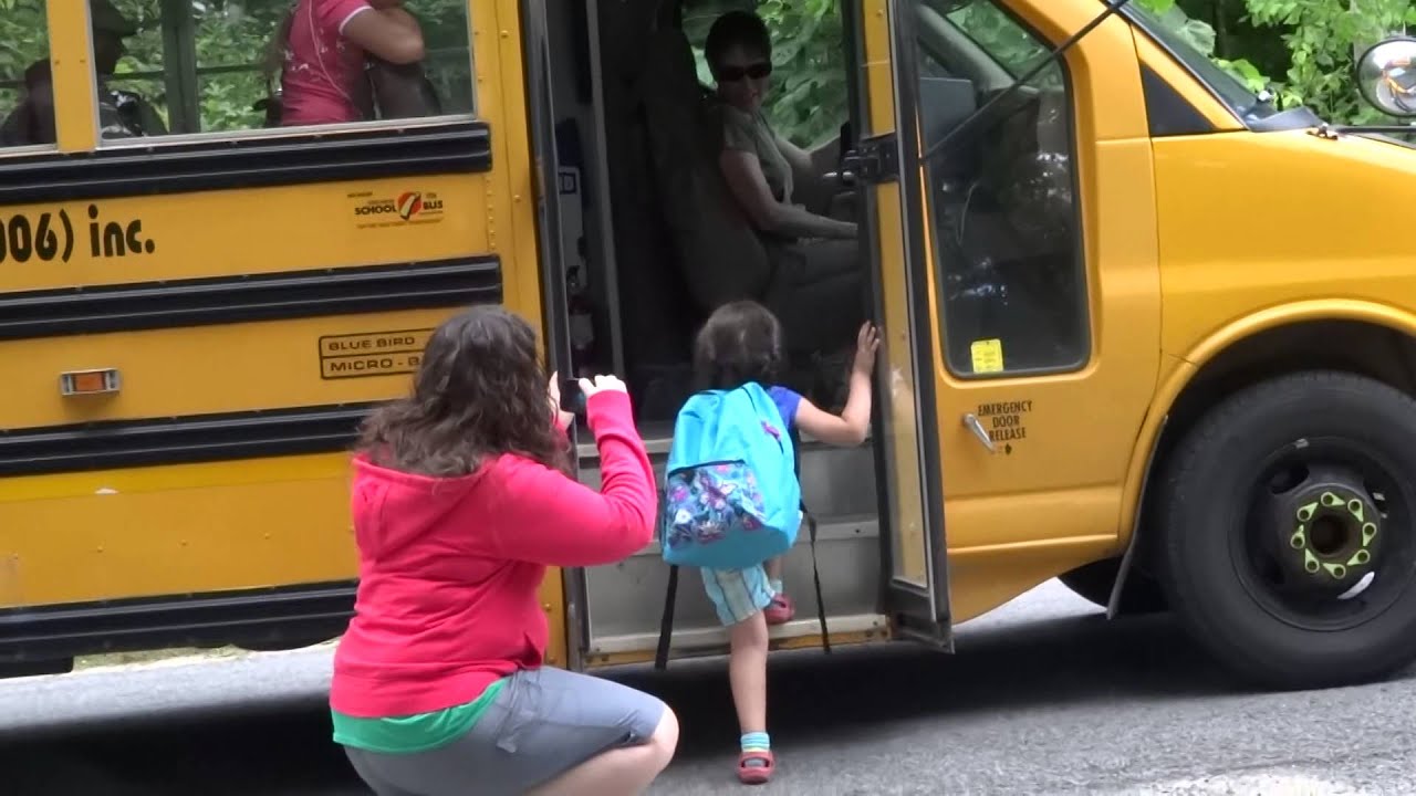 First school day getting on bus. - YouTube