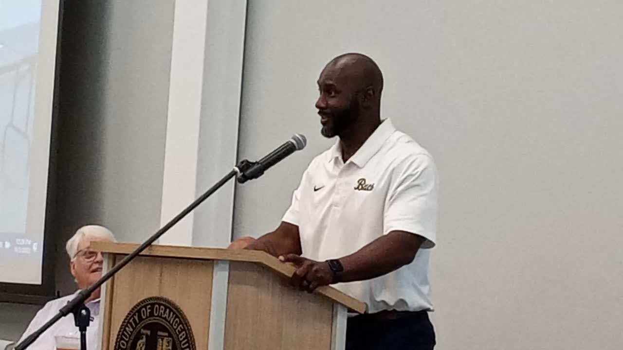 Charleston Southern head football coach Autry Denson speaks to ...