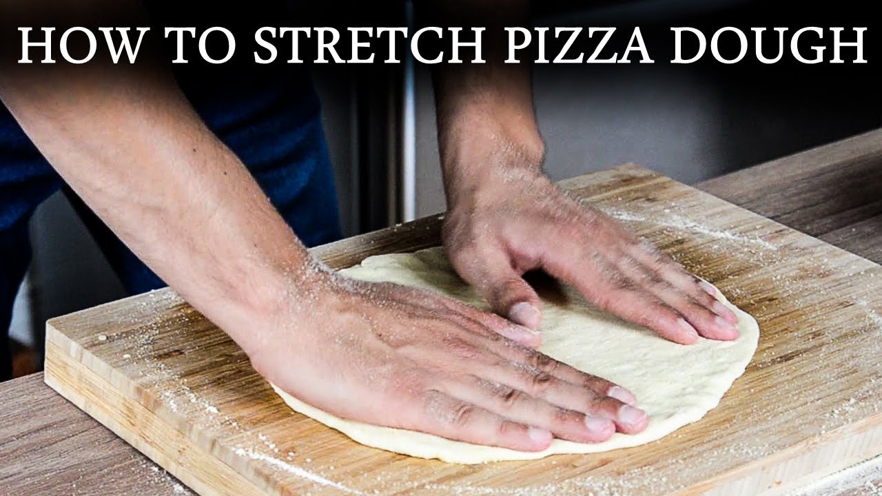 How To Stretch THIN CRUST Pizza Dough By Hand (For Beginners) - YouTube