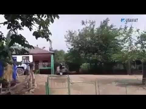Tovuzun döyüş bölgəsində, top atəşi zamanı çiyinlərini belə tərpətməyən sakin.
