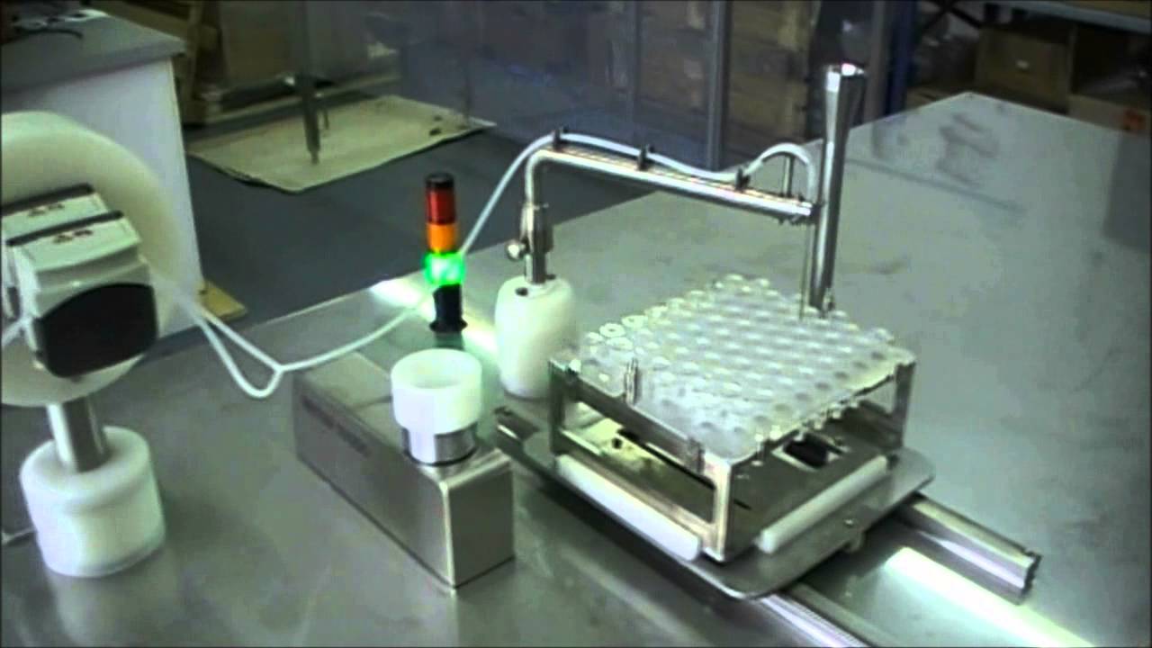 Nest or Tray Liquid Filling Machine F 400 - RAUPACK - YouTube