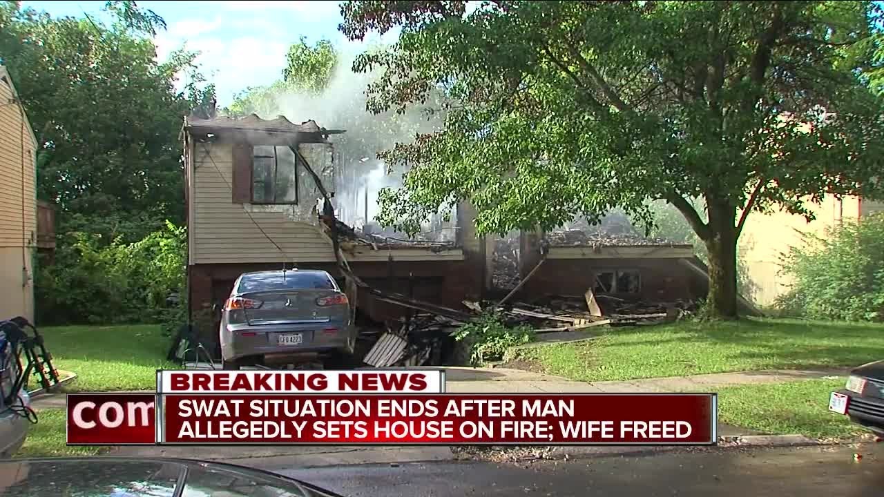 SWAT situation ends after house set on fire - YouTube