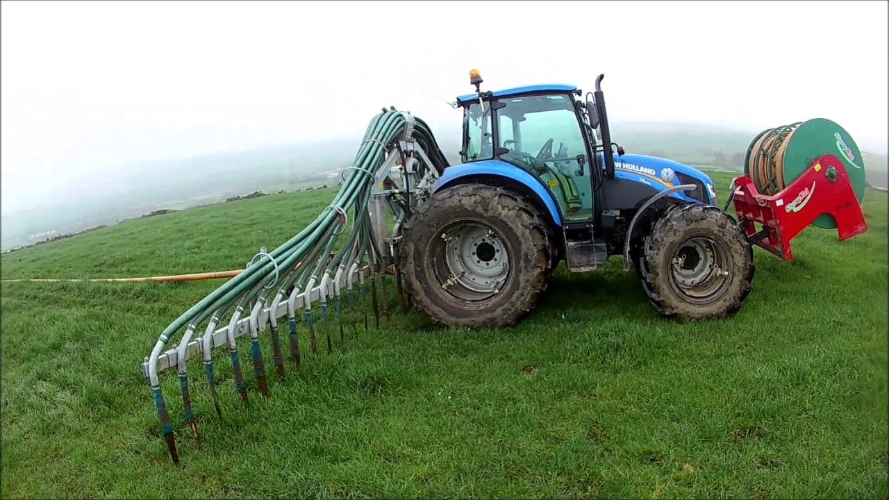 Umbilical slurry spreading with a New Holland T4.105 and SlurryKat 9m ...