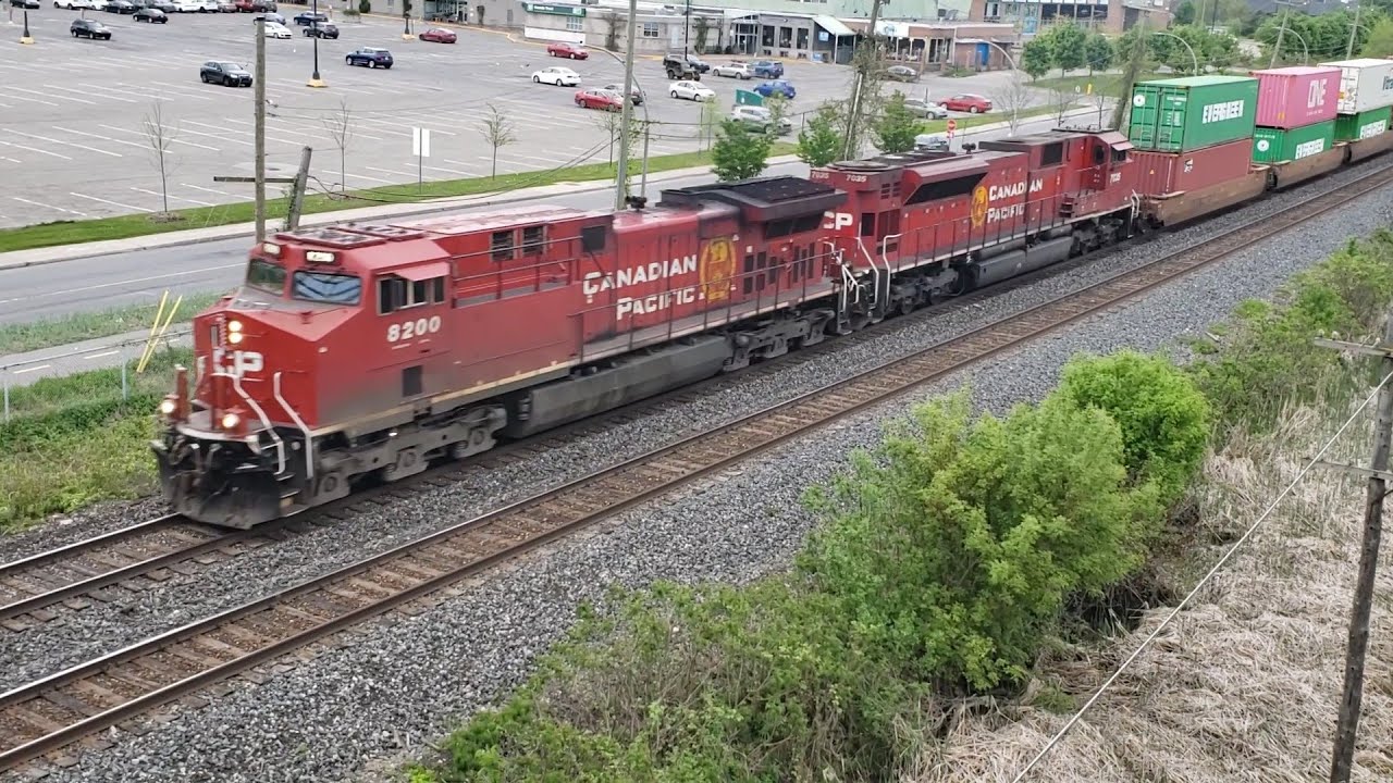 TRAINS CPKC Double Stack With KCS Southern Belles DPU at St John's Blvd Overpass - YouTube