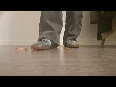 Giantess Zoé crushing gummy bears with her Adidas Spezial and dirty white puma socks